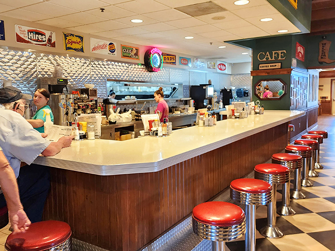 The counter where breakfast dreams come true, complete with classic diner stools that have witnessed countless coffee refills and life stories.
