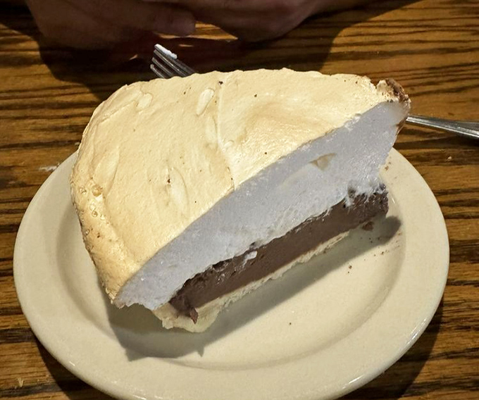 Skip the fancy dessert trends&mdash;this cream pie delivers old-school satisfaction with a towering meringue that demands to be photographed before it's devoured.