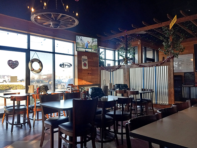 The wagon wheel chandelier and wood-paneled walls create an atmosphere that says, "Yes, we're serious about seafood, but we don't take ourselves too seriously."