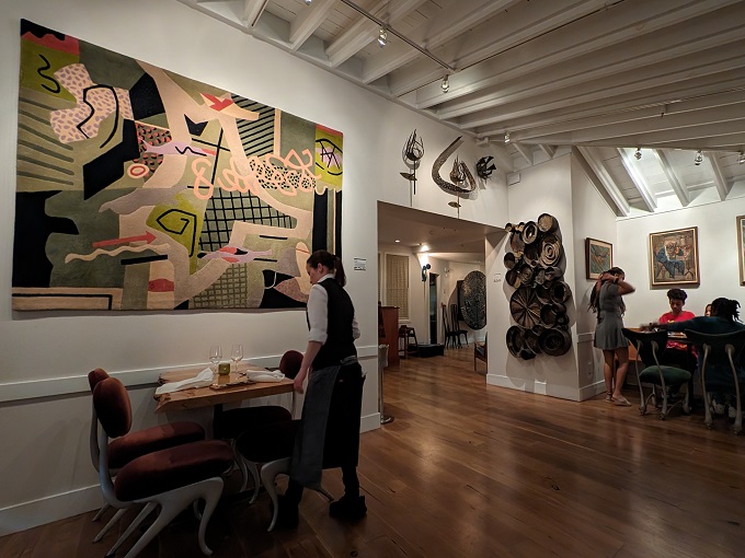 Dining as theater—where the art on the walls competes with the art on your plate, and everybody wins.