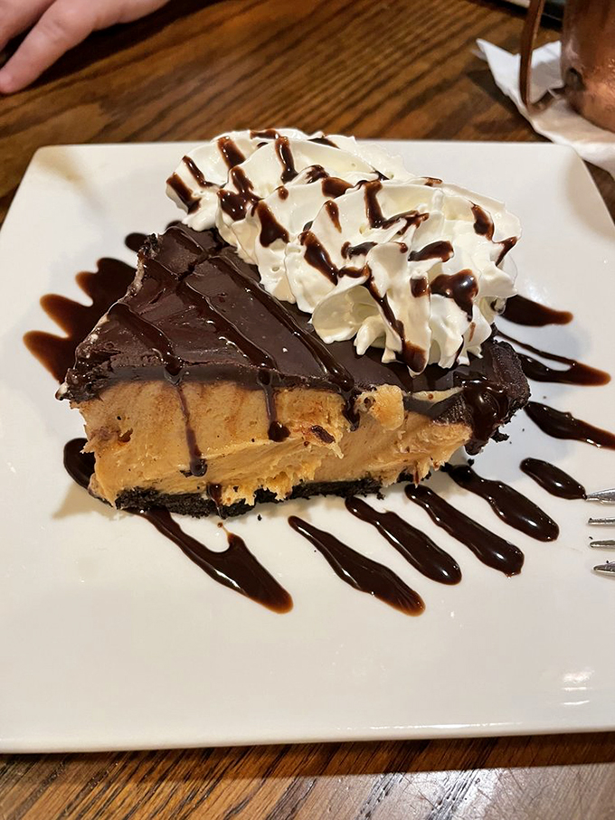 A chocolate peanut butter pie that doesn't just end your meal&mdash;it creates the kind of dessert memory that haunts you at 2 AM three weeks later.