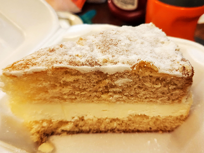 Layer cake that whispers "save room for me" throughout your meal. The cream filling is the plot twist you didn't see coming.