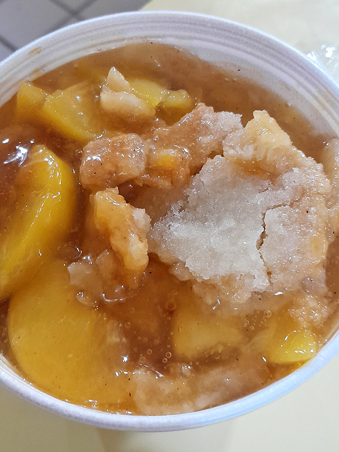 Peach cobbler that makes you understand why Georgia claims the fruit. The perfect sweet finale to a savory chicken symphony.