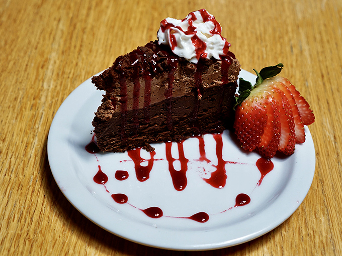 Chocolate cake that doesn't just satisfy your sweet tooth but throws it a full-blown celebration, complete with strawberry and whipped cream confetti.