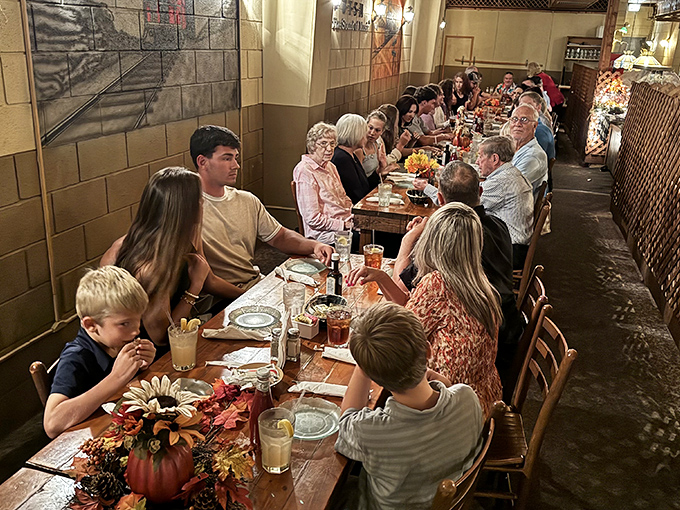 Multiple generations gather around these tables, creating new memories while honoring the tradition of breaking bread together.