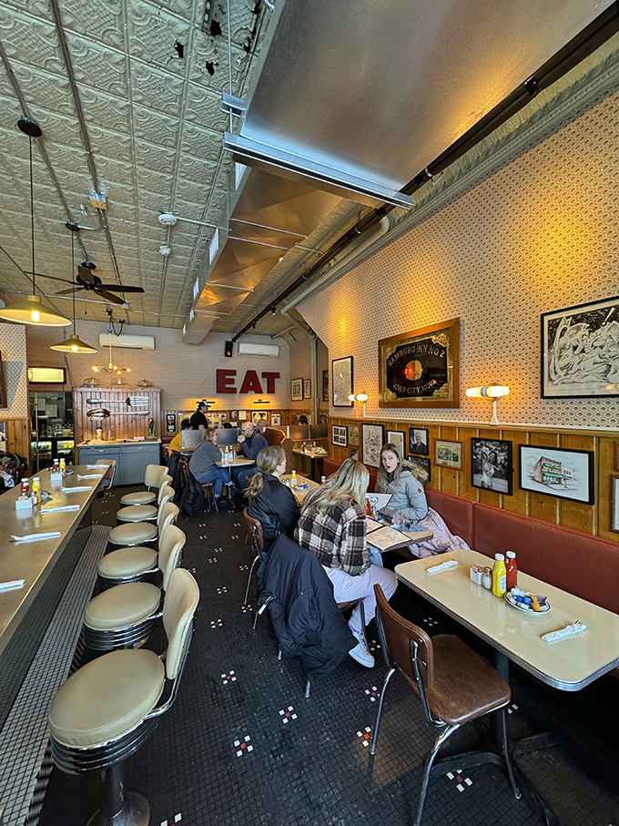 Where strangers become neighbors over coffee refills, beneath pressed tin ceilings that have witnessed first dates, political debates, and countless "just one more bite" moments.