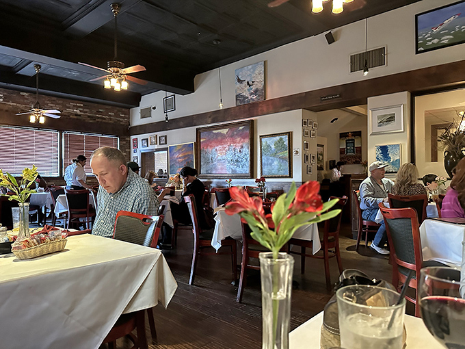 The dining room buzzes with the symphony of clinking glasses and satisfied murmurs&mdash;the universal language of "this was worth the drive."