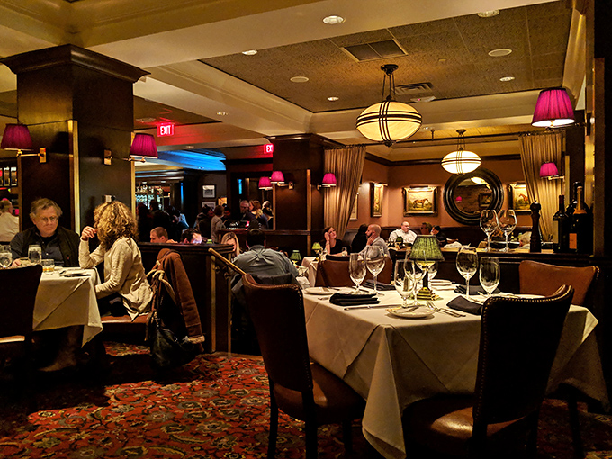 The dining room hums with the universal language of satisfaction &ndash; forks pausing mid-air as diners savor moments of culinary bliss.