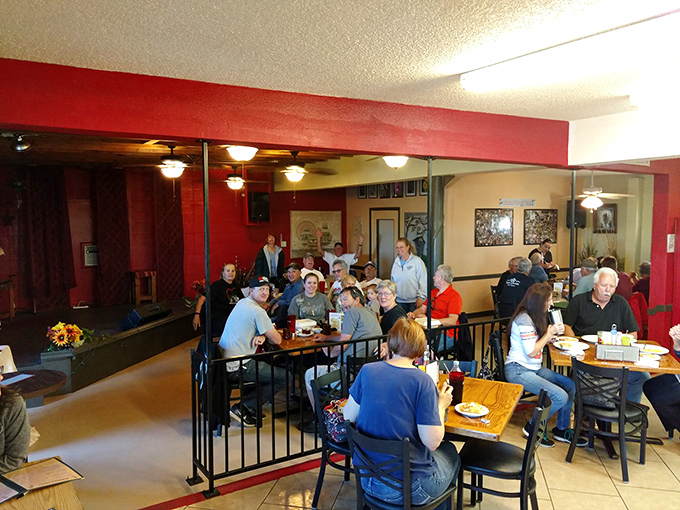 The packed dining room tells you everything you need to know: when locals fill a place this consistently, you've found the real deal.