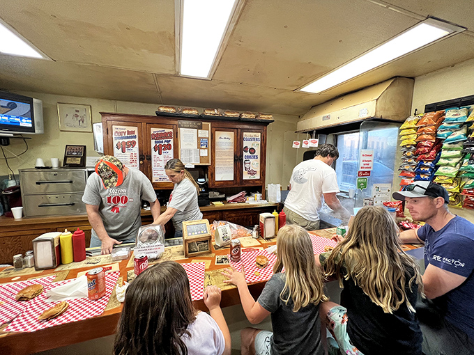 Where burger magic happens. The choreographed dance of cooks and customers has been perfected over 100 years of practice.