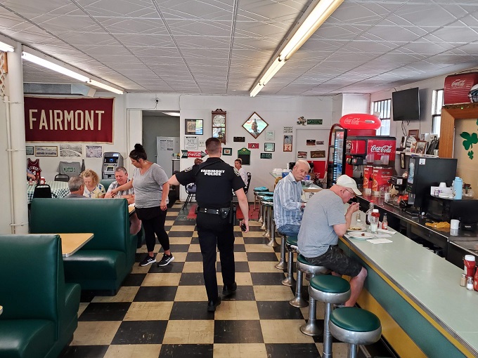 The morning rhythm of McAteer's &ndash; where police officers, retirees, and locals create the perfect small-town symphony.
