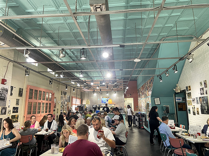 Full house at breakfast&mdash;a democratic assembly united by hotcakes and hash. When the food's this good, strangers become temporary breakfast companions.