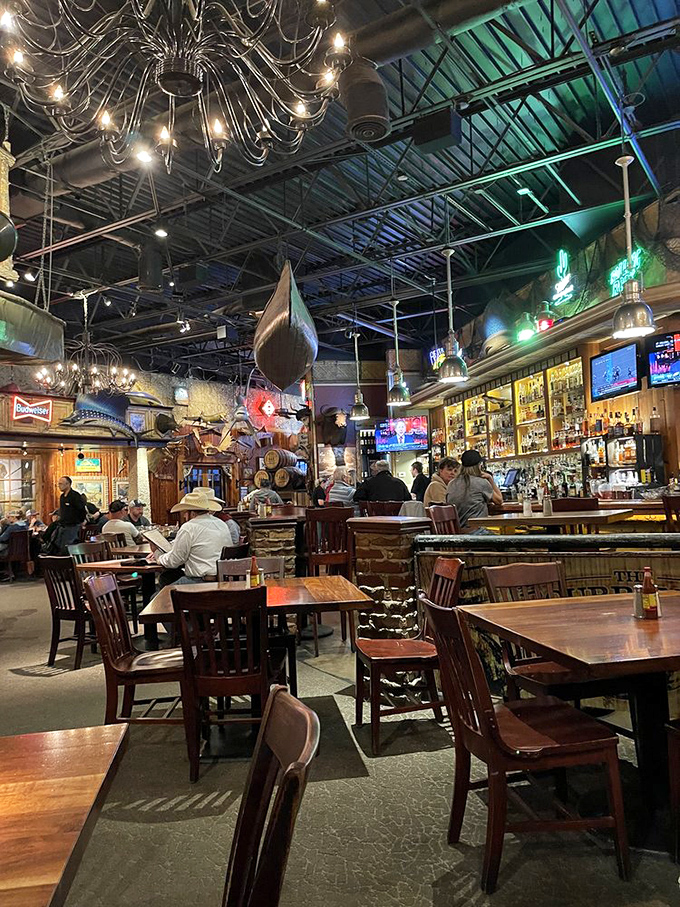 Where rustic meets refined: chandeliers hanging from industrial ceilings while diners enjoy Gulf Coast flavors in the heart of Oklahoma City.