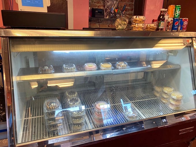 The display case &ndash; where cheesecake dreams line up like contestants in the world's most delicious beauty pageant.