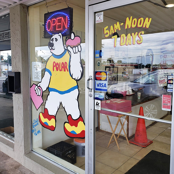 5AM-Noon, seven days a week&mdash;because donut emergencies don't respect weekends. The polar bear mascot stands guard like a sugary sentinel.