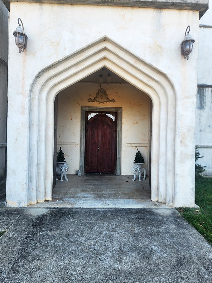 Flanked by decorative lions and elegant lanterns, this entryway beckons visitors into a world where medieval fantasy meets Midwestern hospitality.