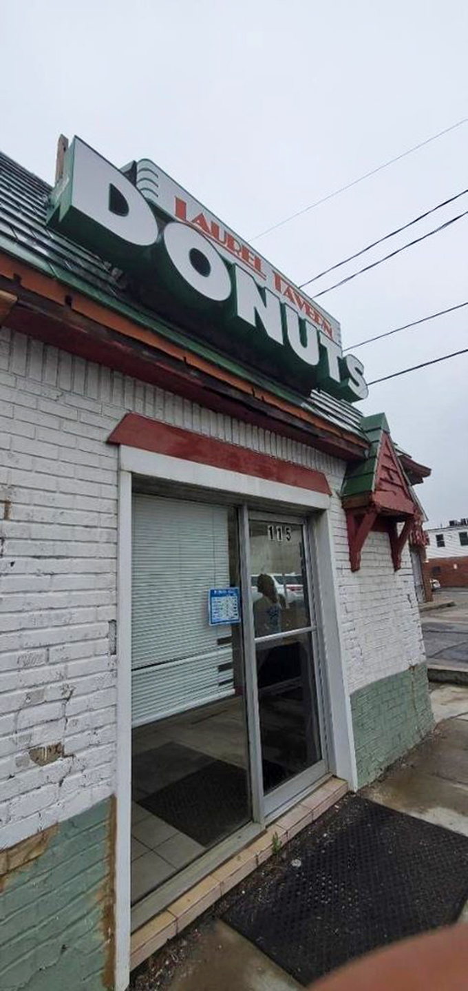 The humble entrance to flavor town. Don't let the weathered exterior fool you&mdash;inside awaits a symphony of sugar and dough.