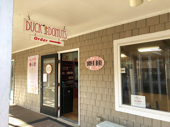 The entrance to happiness is clearly marked. Like the pearly gates, but instead of angels, there are donuts waiting on the other side.