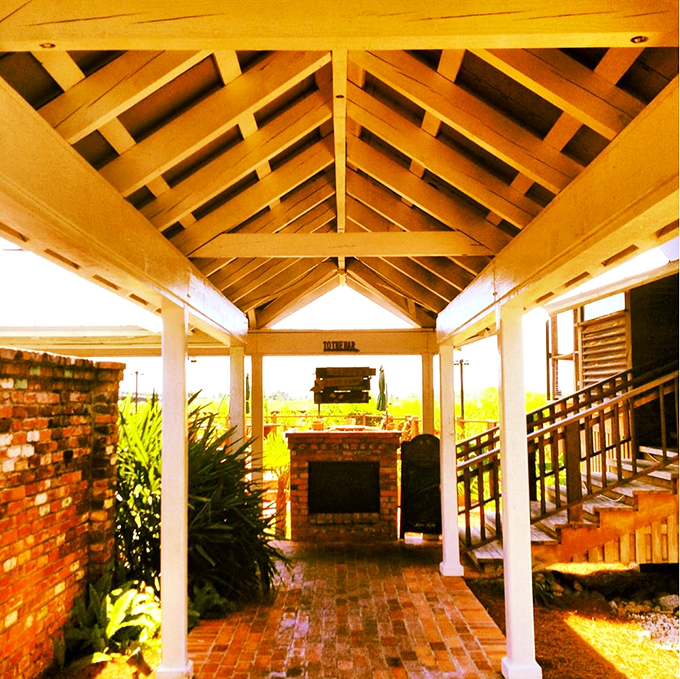 Sunlight streams through this entrance pavilion like nature's spotlight on the brick pathway to seafood nirvana.