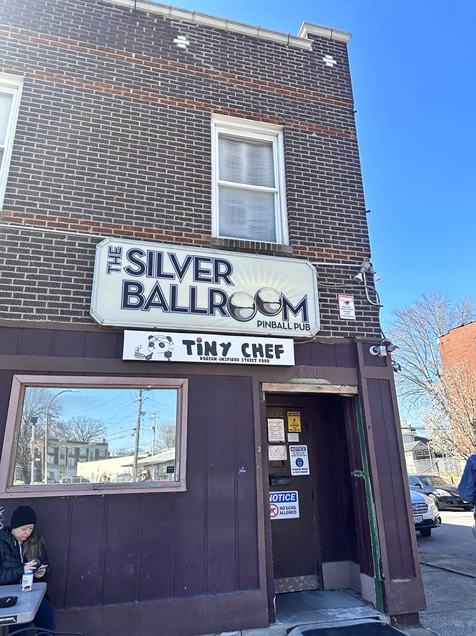 Daylight reveals the unassuming storefront with both Silver Ballroom and Tiny Chef sharing this corner of St. Louis—punk rock pinball and Korean cuisine united in unlikely harmony.