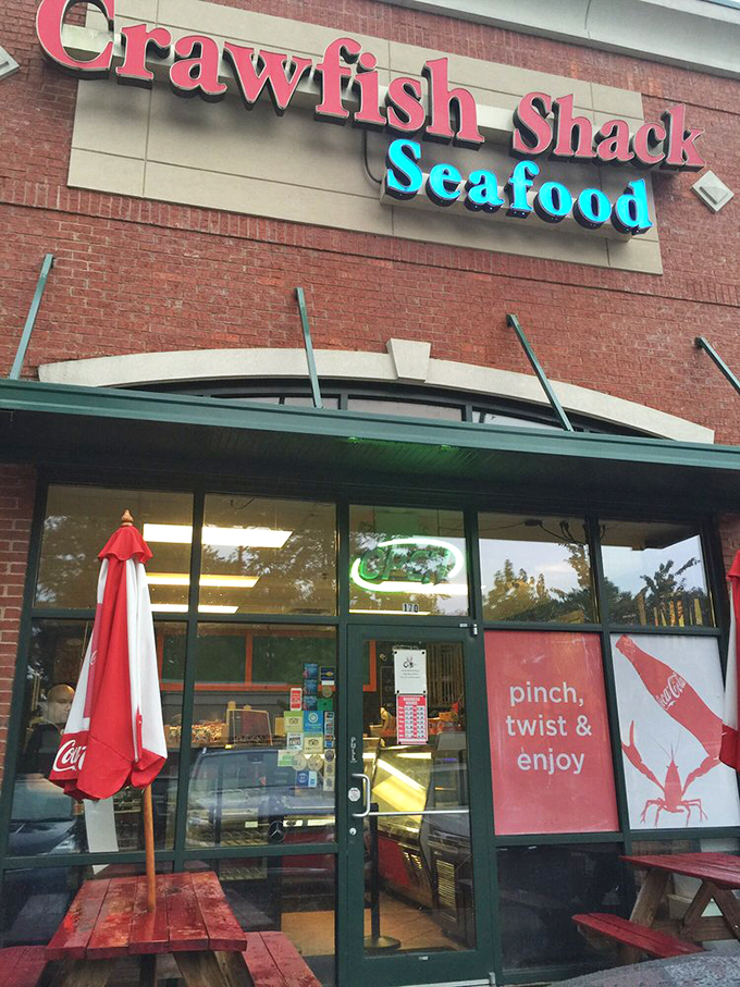 "Pinch, twist & enjoy" isn't just instructions—it's a philosophy. The entrance promises a journey from landlocked Georgia to coastal bliss.