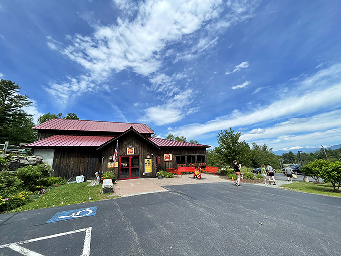 Pilgrims approach the pancake promised land, where red doors welcome the breakfast faithful to a syrup-soaked sanctuary in the mountains.