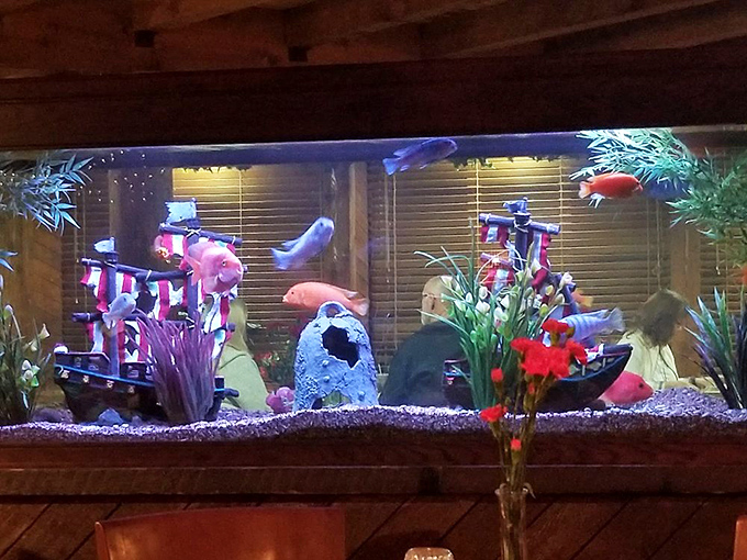 The entryway's wooden fish and twinkling lights create the perfect mood lighting for your upcoming food romance.