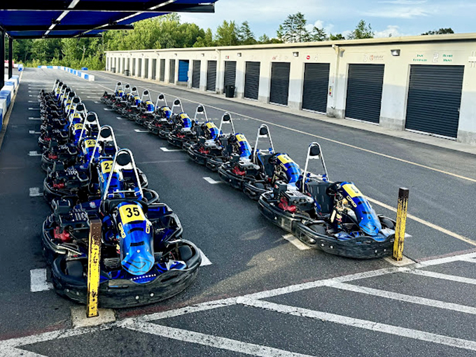 The fleet stands ready for battle, numbered chariots awaiting their next commanders in this modern gladiatorial arena.