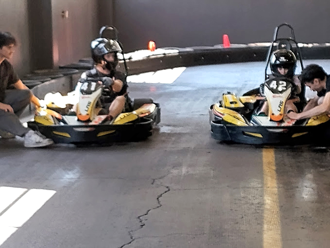 Final adjustments before the green flag drops. In these moments, everyone from accountants to teenagers transforms into racing legends.