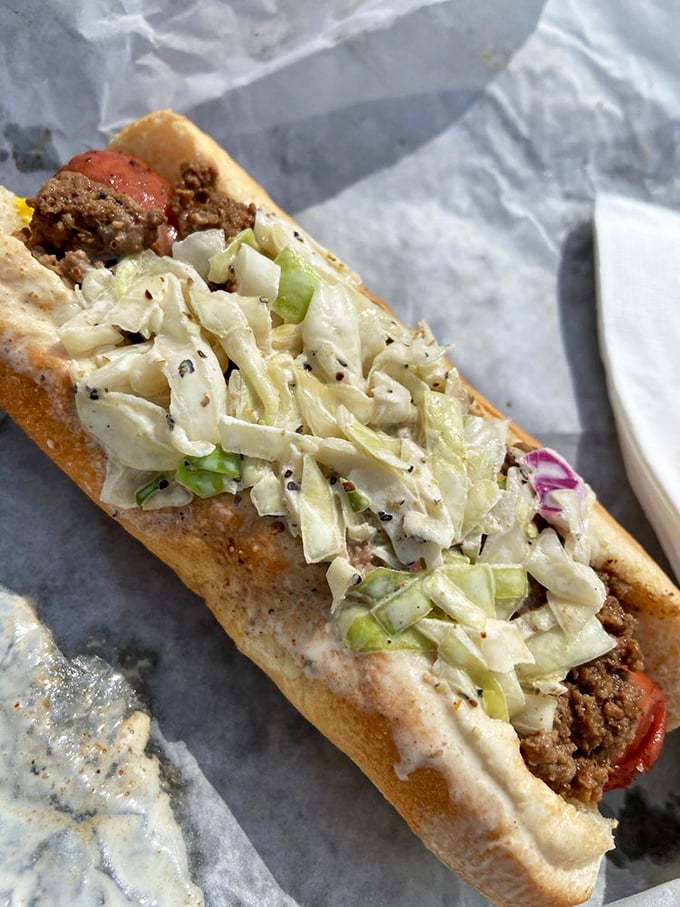 Sometimes a hot dog piled high with fresh slaw just hits different&mdash;simple pleasures elevated to art form at Brooks'.