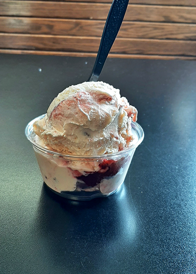 This ice cream sundae doesn't care about your diet plans—berries provide just enough fruit to pretend it's somehow healthier than it gloriously isn't.