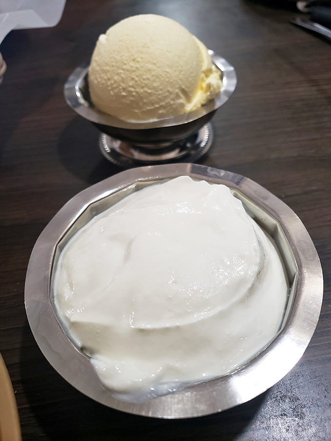 Ice cream and whipped cream served in silver dishes&mdash;because after conquering a Ken's steak, you deserve a little elegance with your dessert. Sweet victory never looked so good.