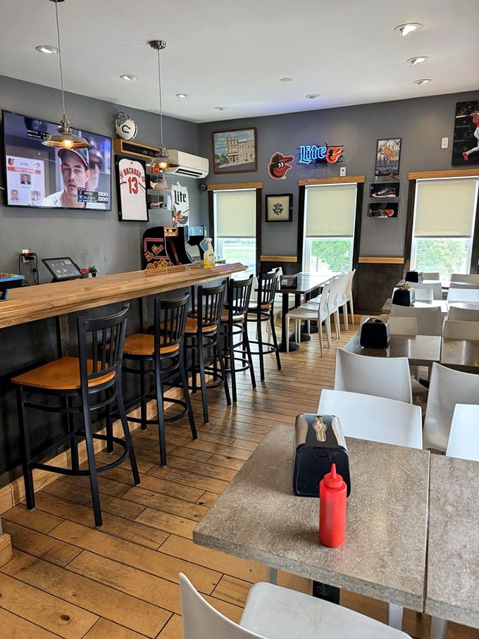 Inside, the Orioles memorabilia and wooden bar tell you this place has earned its local stripes, one perfectly steamed crab at a time.