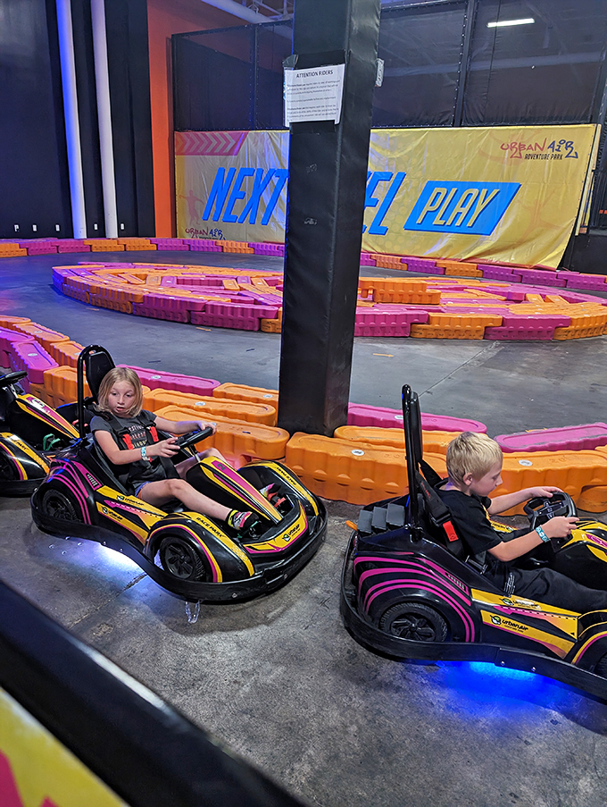 Young racers grip steering wheels with determination that would make Dale Earnhardt Jr. nod in approval&mdash;future NASCAR stars in training.