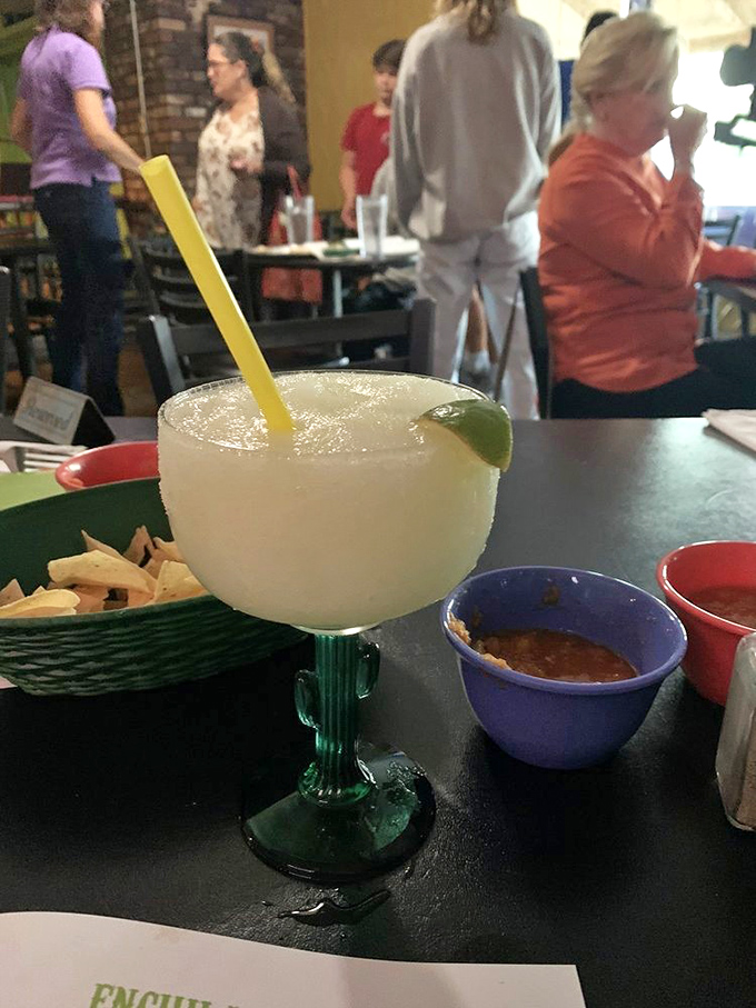 A frosty margarita in a cactus-stemmed glass—the perfect companion for your enchilada adventure and worthy of its own Instagram moment.