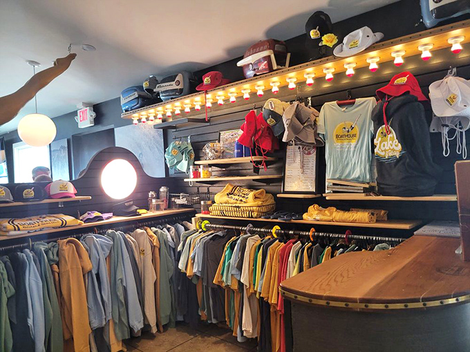 The merch wall tells you this isn't just a restaurant but a lifestyle&mdash;where you can literally wear your love for shrimp and grits on your sleeve.