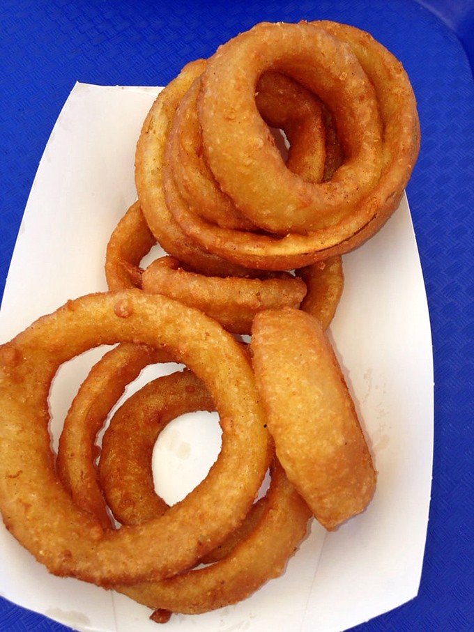 Onion rings that achieve that mythical balance&mdash;crispy enough to crunch, tender enough to bite through cleanly. Seafood's perfect sidekick.