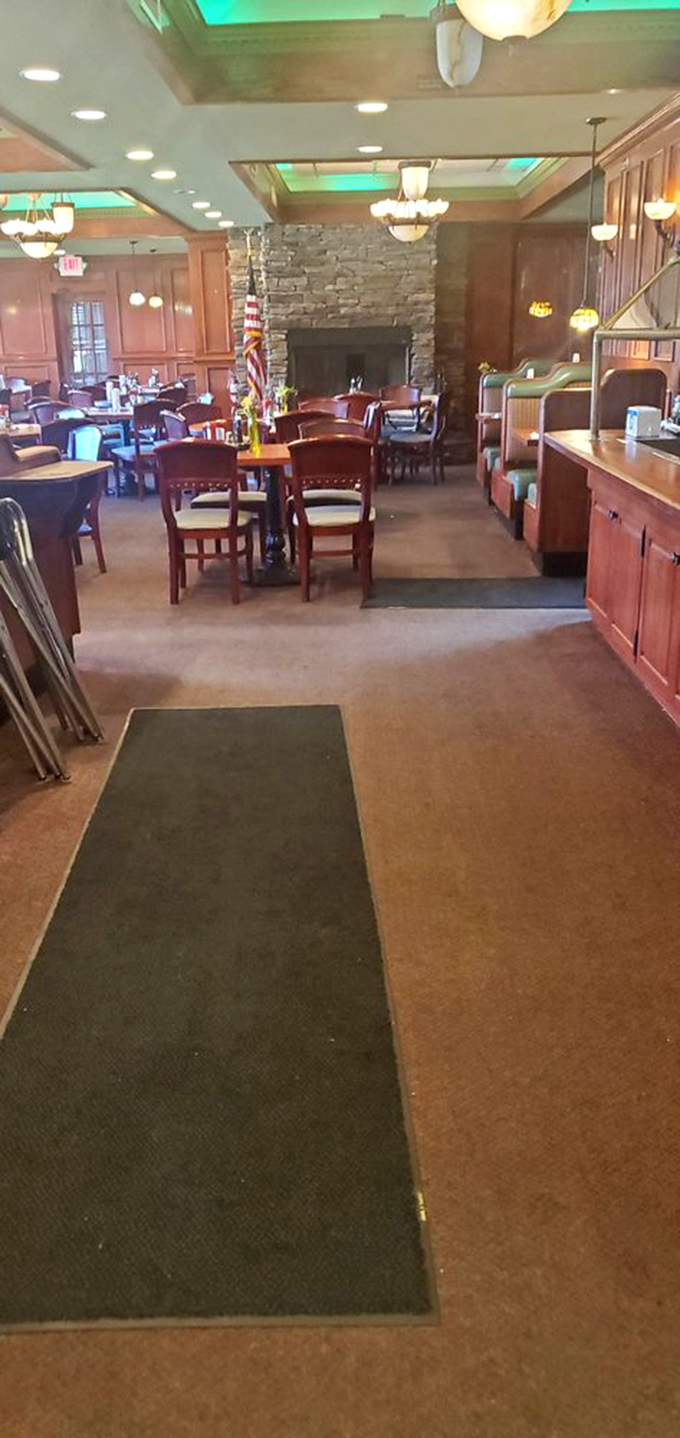 Warm wood, comfortable seating, and a stone fireplace create the perfect backdrop for the impending food coma you've willingly chosen.