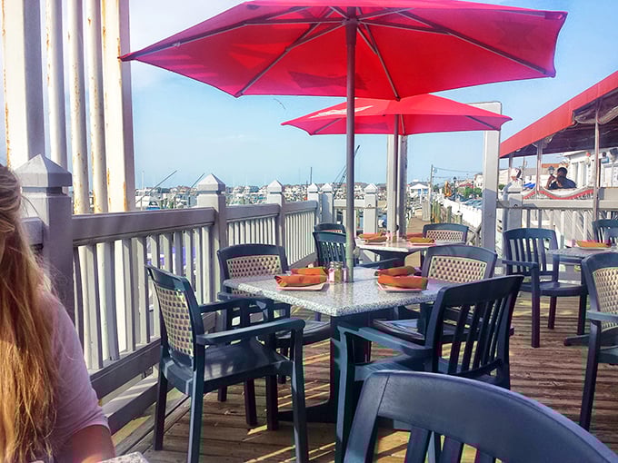 Outdoor dining with a view that reminds you why people fight beach traffic. Ocean breezes included at no extra charge.