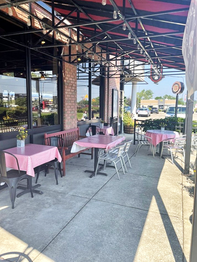 Hoggy's outdoor dining area offers fresh air with your fresh barbecue&mdash;red checkered tables setting the stage for messy, memorable meals.