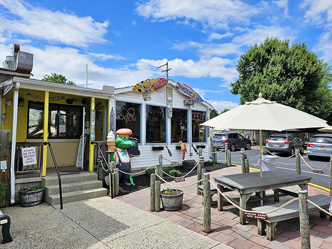The outdoor seating area, complete with umbrella tables and nautical touches, is where memories are made and diets are forgotten.