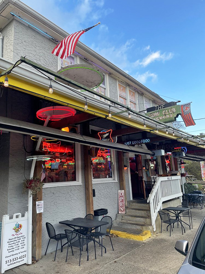 The unassuming facade belies the magic within, but the neon glow peeking through the windows offers tantalizing hints.