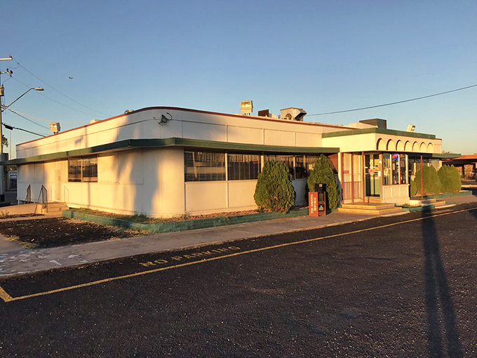 Bathed in golden hour sunlight, Mel's exterior reminds us that some institutions endure because they get the fundamentals right &ndash; good food served with genuine hospitality.