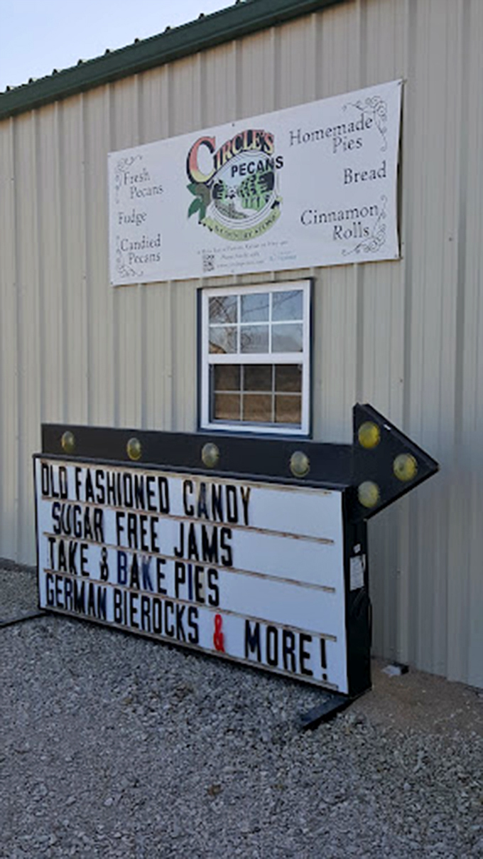 This sign arrow points the way to happiness. "Old Fashioned Candy" and "German Bierocks" have never looked so inviting on a building exterior.