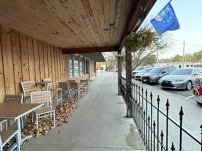 The outdoor seating area offers a glimpse of small-town Sedgwick life, where parking spots are plentiful and hurries are rare.