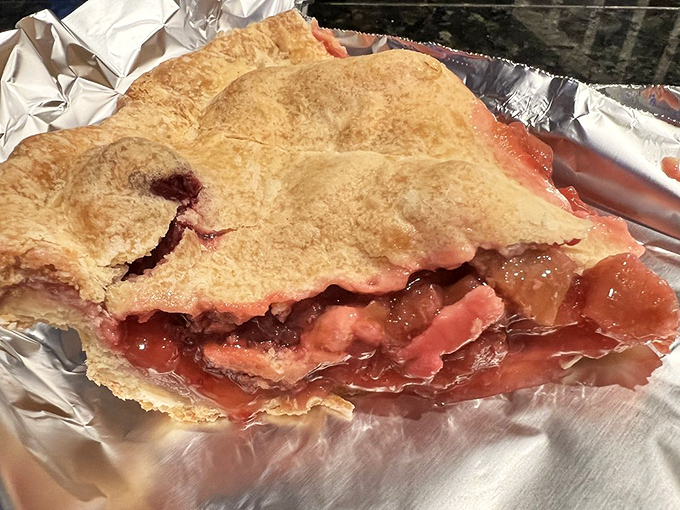 Fruit pie with a crust so flaky it should be illegal, filled with berries that taste like they were picked at the exact perfect moment of ripeness. 