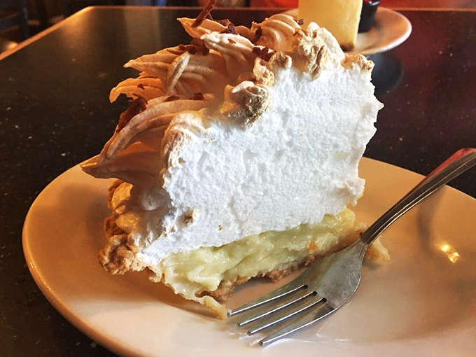 The grand finale&mdash;a towering slice of meringue pie that doesn't understand the concept of moderation. Dessert as it should be: excessive, glorious, and worth every calorie.