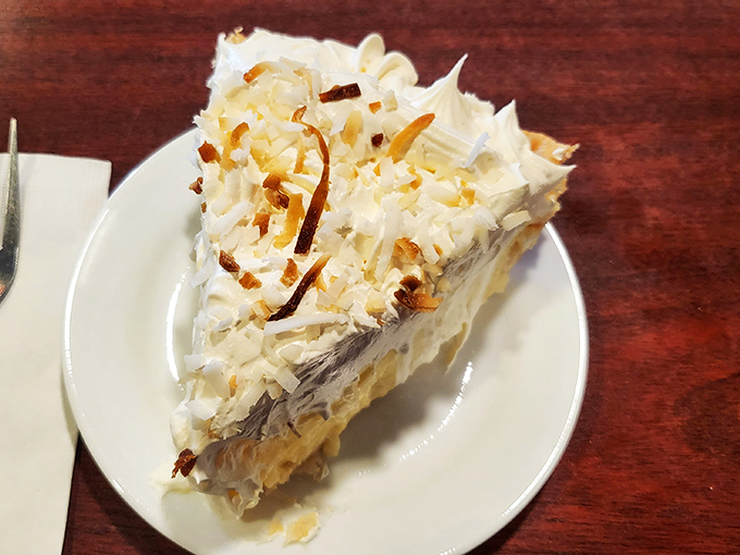 Coconut cream pie that doesn't need to be on a fancy pedestal to be the royalty of the dessert world. Those toasted coconut shavings aren't garnish&mdash;they're the crown.