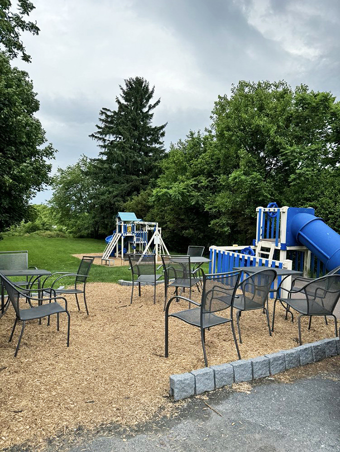 A playground where kids burn energy while parents refuel with caffeine. The perfect symbiotic relationship for family breakfast outings.