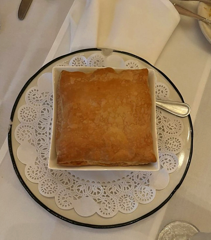 Beneath this golden pastry fortress lies a savory kingdom waiting to be discovered—comfort food elevated to an art form.